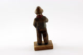 Folk Art Hand-carved, painted figurine Man with Pipe – With A Past